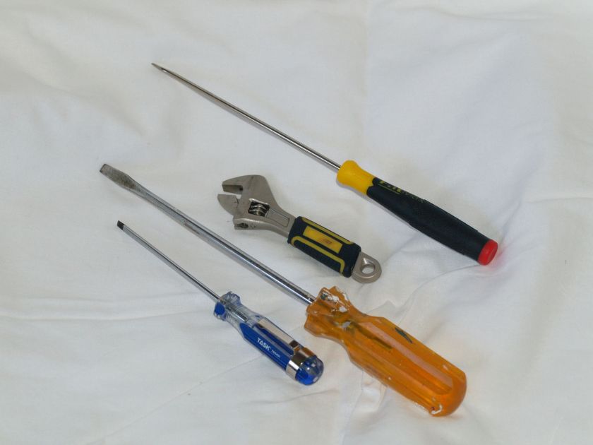 Five essential tools for antique and vintage clock repairers on a ...